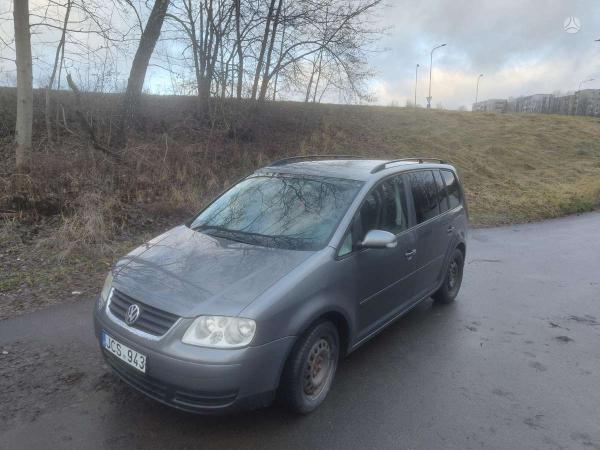 Grey Volkswagen Touran 2004 in Vilnius, with an engine capacity of 1.90 L and mileage of 340 thousand km for 1500 €, photo 2 on AUTOMOTO.COM.LV