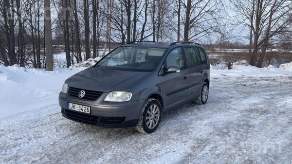 Grey Volkswagen Touran 2004 in Liepaja, with an engine capacity of 1.90 L and mileage of 300 thousand km for 2150 €, photo 1 on AUTOMOTO.COM.LV