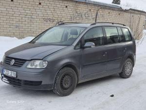 Grey Volkswagen Touran 2004 in Ukmerge, with an engine capacity of 1.90 L and mileage of 258 thousand km for 1100 €, photo  on AUTOMOTO.COM.LV