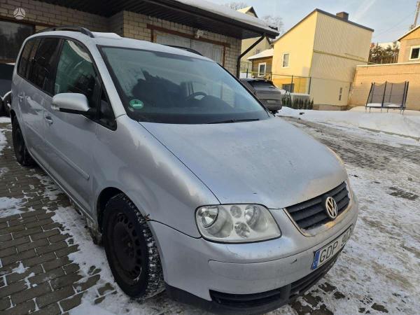Grey Volkswagen Touran 2004 in Kaunas, with an engine capacity of 1.90 L and mileage of 339 thousand km for 2200 €, photo 2 on AUTOMOTO.COM.LV