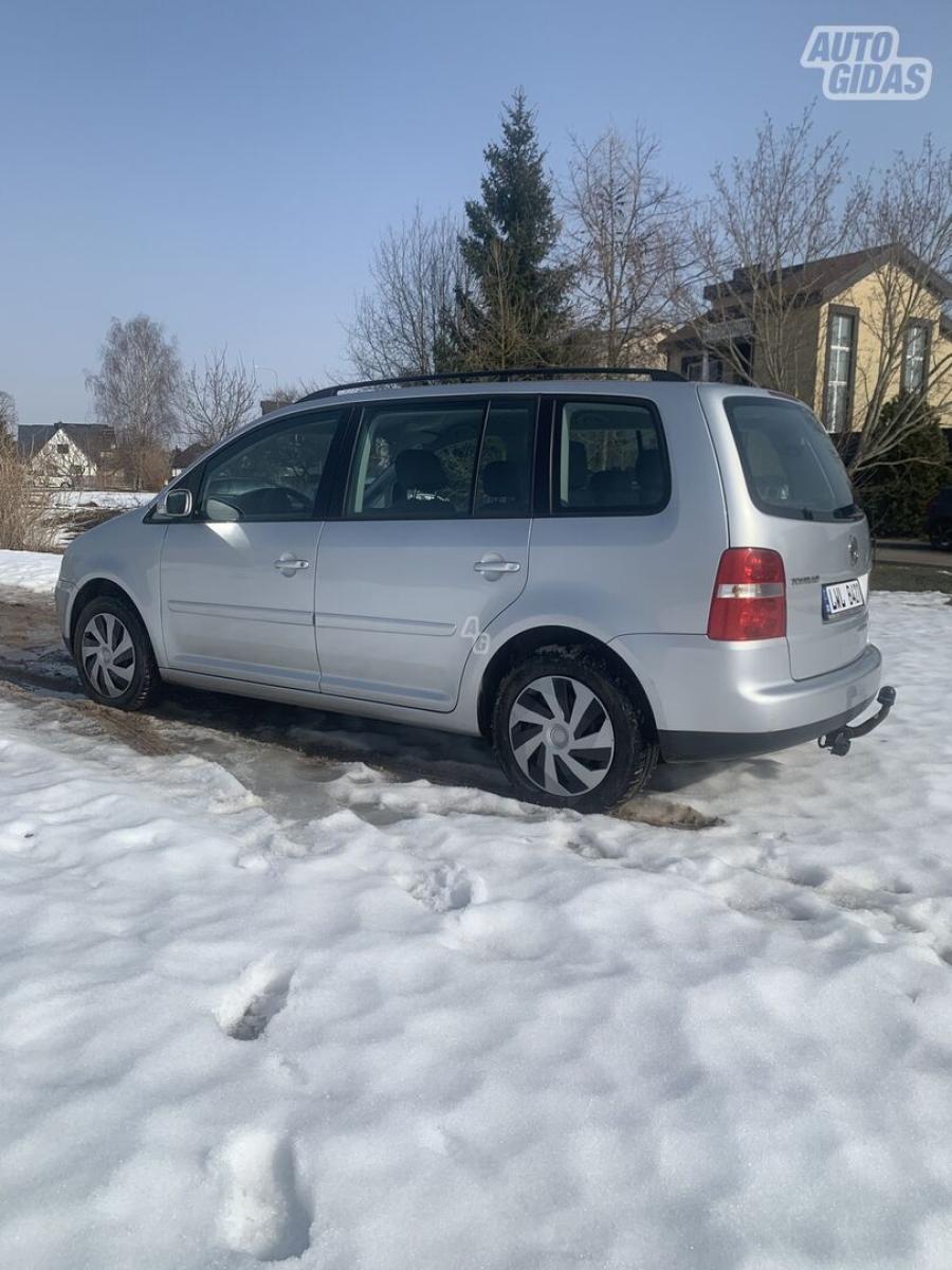 Grey Volkswagen Touran 2004 in Siauliai, with an engine capacity of 1.90 L and mileage of 236 thousand km for 1550 €, photo 6 on AUTOMOTO.COM.LV