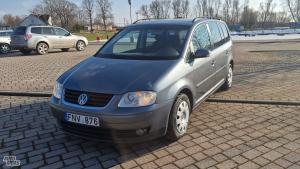 Grey Volkswagen Touran 2004 in Silute, with an engine capacity of 1.90 L and mileage of 402 thousand km for 1850 €, photo 2 on AUTOMOTO.COM.LV