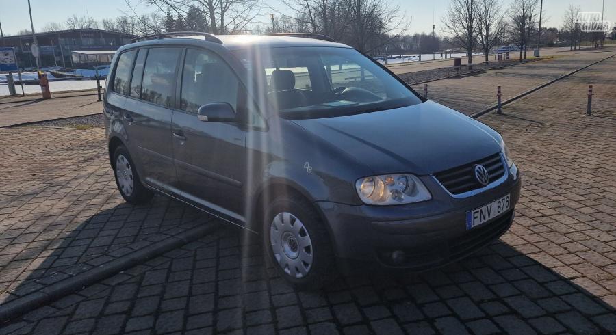 Grey Volkswagen Touran 2004 in Silute, with an engine capacity of 1.90 L and mileage of 402 thousand km for 1850 €, photo 3 on AUTOMOTO.COM.LV