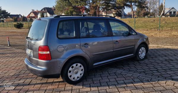 Grey Volkswagen Touran 2004 in Silute, with an engine capacity of 1.90 L and mileage of 402 thousand km for 1850 €, photo 4 on AUTOMOTO.COM.LV