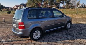 Grey Volkswagen Touran 2004 in Silute, with an engine capacity of 1.90 L and mileage of 402 thousand km for 1850 €, photo 4 on AUTOMOTO.COM.LV