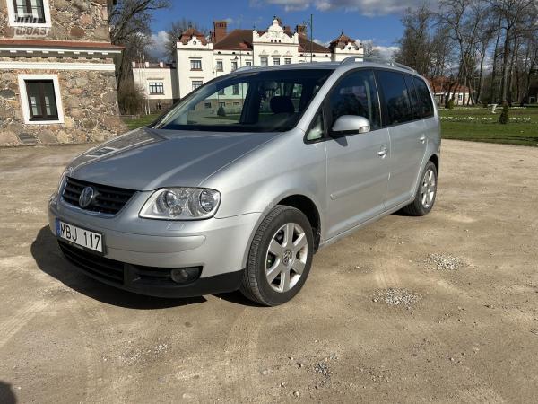 Grey Volkswagen Touran 2004 in Vilnius, with an engine capacity of 2.00 L and mileage of 283 thousand km for 1400 €, photo 3 on AUTOMOTO.COM.LV