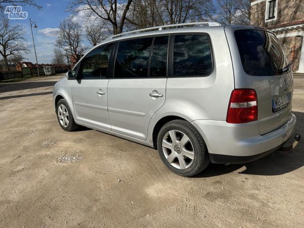 Grey Volkswagen Touran 2004 in Vilnius, with an engine capacity of 2.00 L and mileage of 283 thousand km for 1400 €, photo 5 on AUTOMOTO.COM.LV