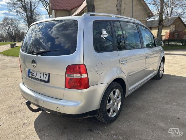 Grey Volkswagen Touran 2004 in Vilnius, with an engine capacity of 2.00 L and mileage of 283 thousand km for 1400 €, photo 7 on AUTOMOTO.COM.LV
