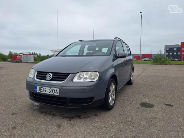 Grey Volkswagen Touran 2004 in Telschi, with an engine capacity of 1.90 L and mileage of 300 thousand km for 999 €, photo 1 on AUTOMOTO.COM.LV