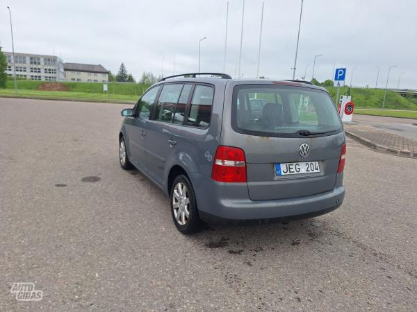 Grey Volkswagen Touran 2004 in Telschi, with an engine capacity of 1.90 L and mileage of 300 thousand km for 999 €, photo 5 on AUTOMOTO.COM.LV