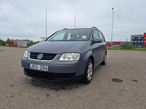 Grey Volkswagen Touran 2004 in Telschi, with an engine capacity of 1.90 L and mileage of 300 thousand km for 899 €, photo 3 on AUTOMOTO.COM.LV