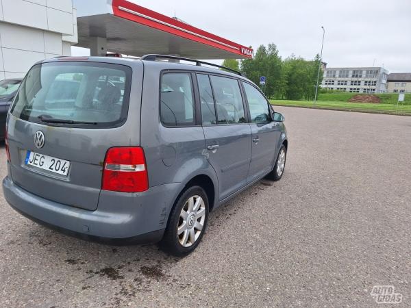Grey Volkswagen Touran 2004 in Telschi, with an engine capacity of 1.90 L and mileage of 300 thousand km for 899 €, photo 6 on AUTOMOTO.COM.LV