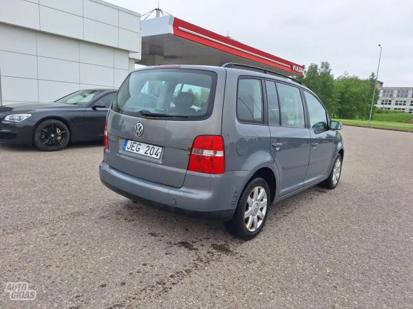 Grey Volkswagen Touran 2004 in Telschi, with an engine capacity of 1.90 L and mileage of 300 thousand km for 899 €, photo 7 on AUTOMOTO.COM.LV