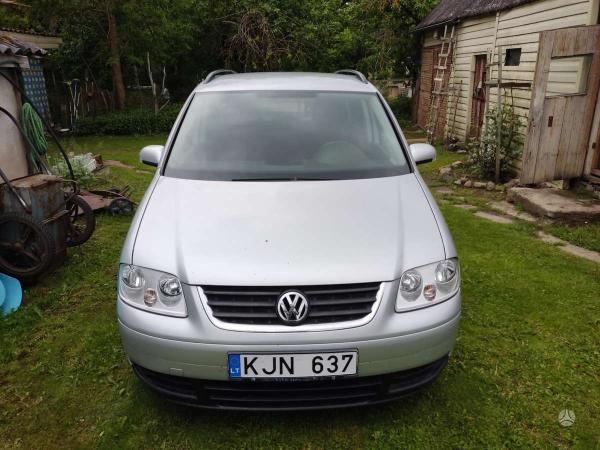 Pelēks Volkswagen Touran 2004 Pakruojis, ar dzinēja tilpumu 1.97 L un nobraukumu 222 tūkst. km par 1000 €, foto 2 vietnē AUTOMOTO.COM.LV