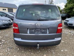 Grey Volkswagen Touran 2004 in Birzai, with an engine capacity of 1.90 L and mileage of 263 thousand km for 2450 €, photo 7 on AUTOMOTO.COM.LV