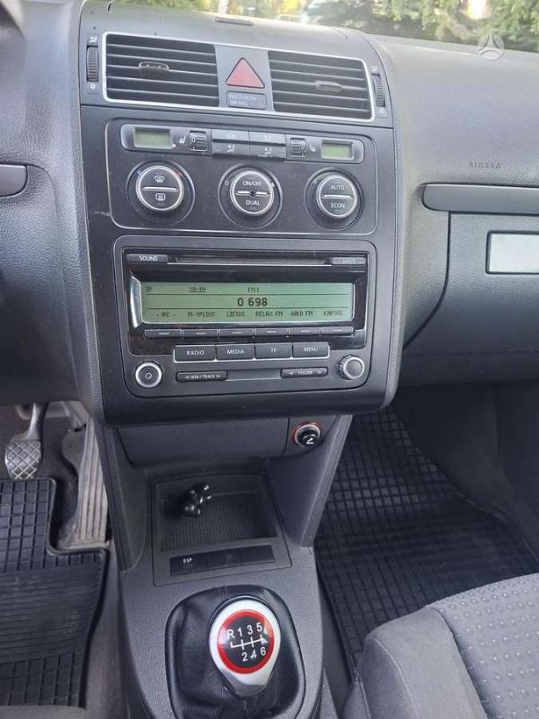 Grey Volkswagen Touran 2004 in Marijampole, with an engine capacity of 1.97 L and mileage of 209 thousand km for 2300 €, photo 7 on AUTOMOTO.COM.LV