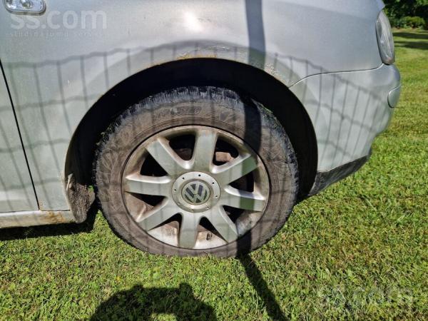 Grey Volkswagen Touran 2004 in Ludza, with an engine capacity of 1.90 L and mileage of 249 thousand km for 700 €, photo 8 on AUTOMOTO.COM.LV