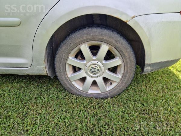 Grey Volkswagen Touran 2004 in Ludza, with an engine capacity of 1.90 L and mileage of 249 thousand km for 700 €, photo 10 on AUTOMOTO.COM.LV