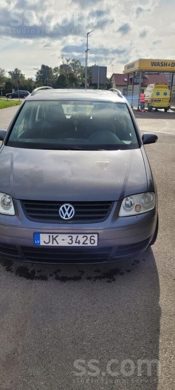 Pelēks Volkswagen Touran 2004 Liepāja, ar dzinēja tilpumu 1.90 L un nobraukumu 300 tūkst. km par 1850 €, foto 2 vietnē AUTOMOTO.COM.LV