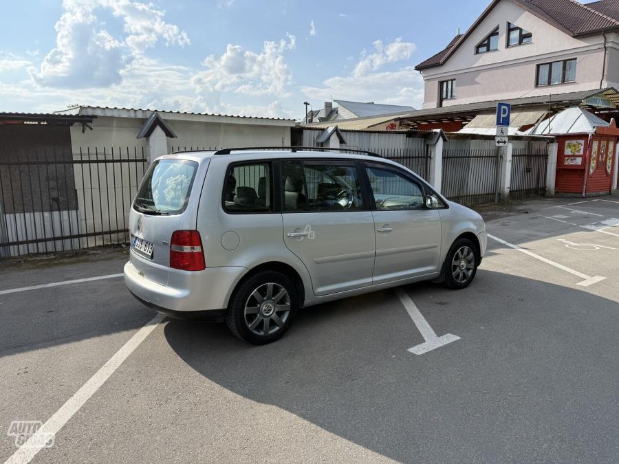 Grey Volkswagen Touran 2004 in Panevezys, with an engine capacity of 1.90 L and mileage of 356 thousand km for 1250 €, photo 3 on AUTOMOTO.COM.LV