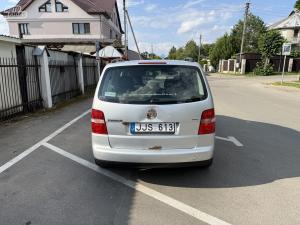 Grey Volkswagen Touran 2004 in Panevezys, with an engine capacity of 1.90 L and mileage of 356 thousand km for 1250 €, photo 4 on AUTOMOTO.COM.LV