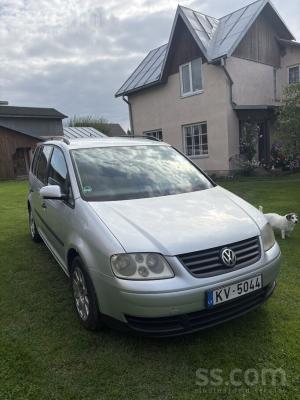 Grey Volkswagen Touran 2004 in Riga, with an engine capacity of 1.90 L and mileage of 293 thousand km for 1000 €, photo  on AUTOMOTO.COM.LV