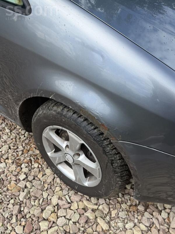 Pelēks Volkswagen Touran 2004 Ogre, ar dzinēja tilpumu 2.00 L un nobraukumu 337 tūkst. km par 525 €, foto 7 vietnē AUTOMOTO.COM.LV