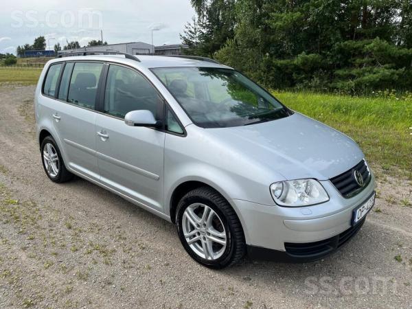 Grey Volkswagen Touran 2004 in Tukums, with an engine capacity of 2.00 L and mileage of 241 thousand km for 2190 €, photo 1 on AUTOMOTO.COM.LV