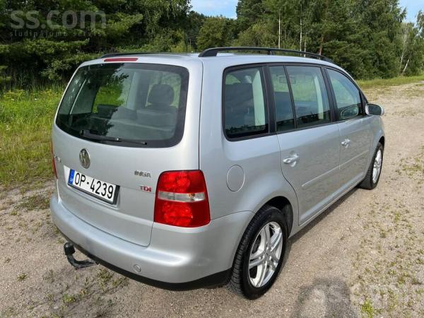 Grey Volkswagen Touran 2004 in Tukums, with an engine capacity of 2.00 L and mileage of 241 thousand km for 2190 €, photo 7 on AUTOMOTO.COM.LV