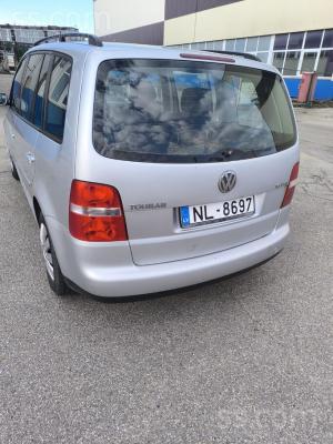 Grey Volkswagen Touran 2004 in Riga, with an engine capacity of 1.60 L and mileage of 210 thousand km for 1250 €, photo 5 on AUTOMOTO.COM.LV