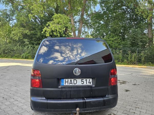 Grey Volkswagen Touran 2004 in Klaipeda, with an engine capacity of 1.90 L and mileage of 390 thousand km for 1650 €, photo 6 on AUTOMOTO.COM.LV