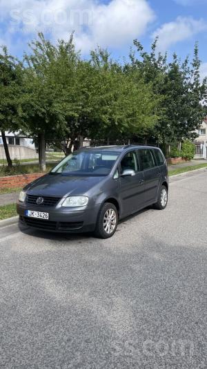 Grey Volkswagen Touran 2004 in Liepaja, with an engine capacity of 1.90 L and mileage of 301 thousand km for 1290 €, photo  on AUTOMOTO.COM.LV