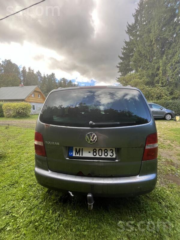Pelēks Volkswagen Touran 2004 Dobele, ar dzinēja tilpumu 1.90 L un nobraukumu 305 tūkst. km par 690 €, foto 5 vietnē AUTOMOTO.COM.LV
