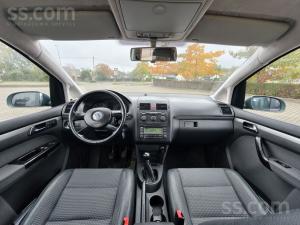 Grey Volkswagen Touran 2004 in Riga, with an engine capacity of 1.90 L and mileage of 429 thousand km for 2500 €, photo 12 on AUTOMOTO.COM.LV