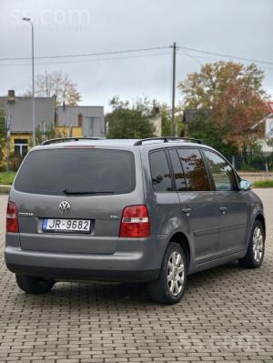 Grey Volkswagen Touran 2004 in Riga, with an engine capacity of 1.90 L and mileage of 429 thousand km for 2500 €, photo 13 on AUTOMOTO.COM.LV