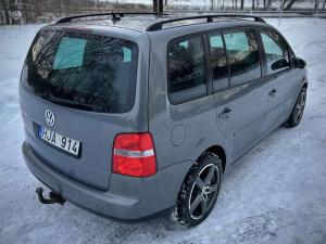 Pelēks Volkswagen Touran 2005 Viļņa, ar dzinēja tilpumu 1.97 L un nobraukumu 245 tūkst. km par 1899 €, foto 5 vietnē AUTOMOTO.COM.LV