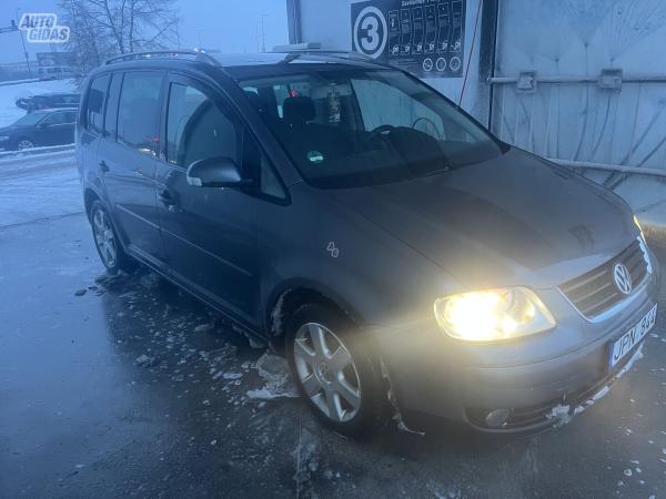 Grey Volkswagen Touran 2005 in Kaunas, with an engine capacity of 2.00 L and mileage of 308 thousand km for 1550 €, photo 2 on AUTOMOTO.COM.LV
