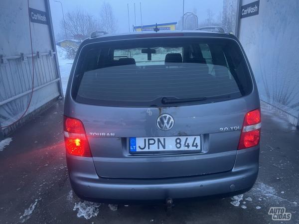 Grey Volkswagen Touran 2005 in Kaunas, with an engine capacity of 2.00 L and mileage of 308 thousand km for 1550 €, photo 4 on AUTOMOTO.COM.LV