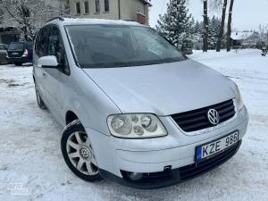Grey Volkswagen Touran 2005 in Panevezys, with an engine capacity of 1.90 L and mileage of 400 thousand km for 1599 €, photo 5 on AUTOMOTO.COM.LV