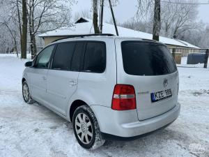 Grey Volkswagen Touran 2005 in Panevezys, with an engine capacity of 1.90 L and mileage of 400 thousand km for 1599 €, photo 8 on AUTOMOTO.COM.LV