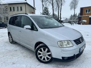 Grey Volkswagen Touran 2005 in Panevezys, with an engine capacity of 1.90 L and mileage of 400 thousand km for 1595 €, photo 4 on AUTOMOTO.COM.LV