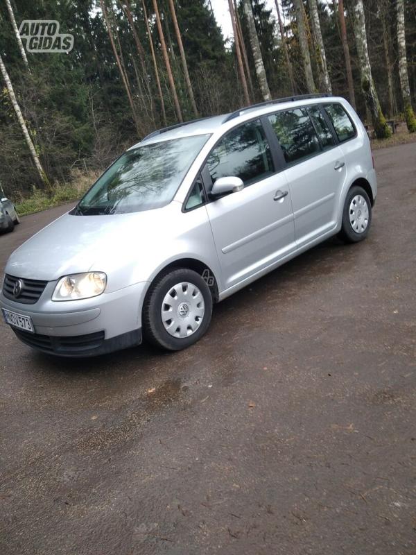 Grey Volkswagen Touran 2005 in Taurage, with an engine capacity of 1.90 L and mileage of 272 thousand km for 2400 €, photo 3 on AUTOMOTO.COM.LV