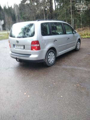 Grey Volkswagen Touran 2005 in Taurage, with an engine capacity of 1.90 L and mileage of 272 thousand km for 2400 €, photo 5 on AUTOMOTO.COM.LV