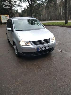 Grey Volkswagen Touran 2005 in Taurage, with an engine capacity of 1.90 L and mileage of 272 thousand km for 2400 €, photo 7 on AUTOMOTO.COM.LV