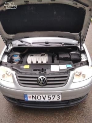 Grey Volkswagen Touran 2005 in Taurage, with an engine capacity of 1.90 L and mileage of 272 thousand km for 2400 €, photo 8 on AUTOMOTO.COM.LV