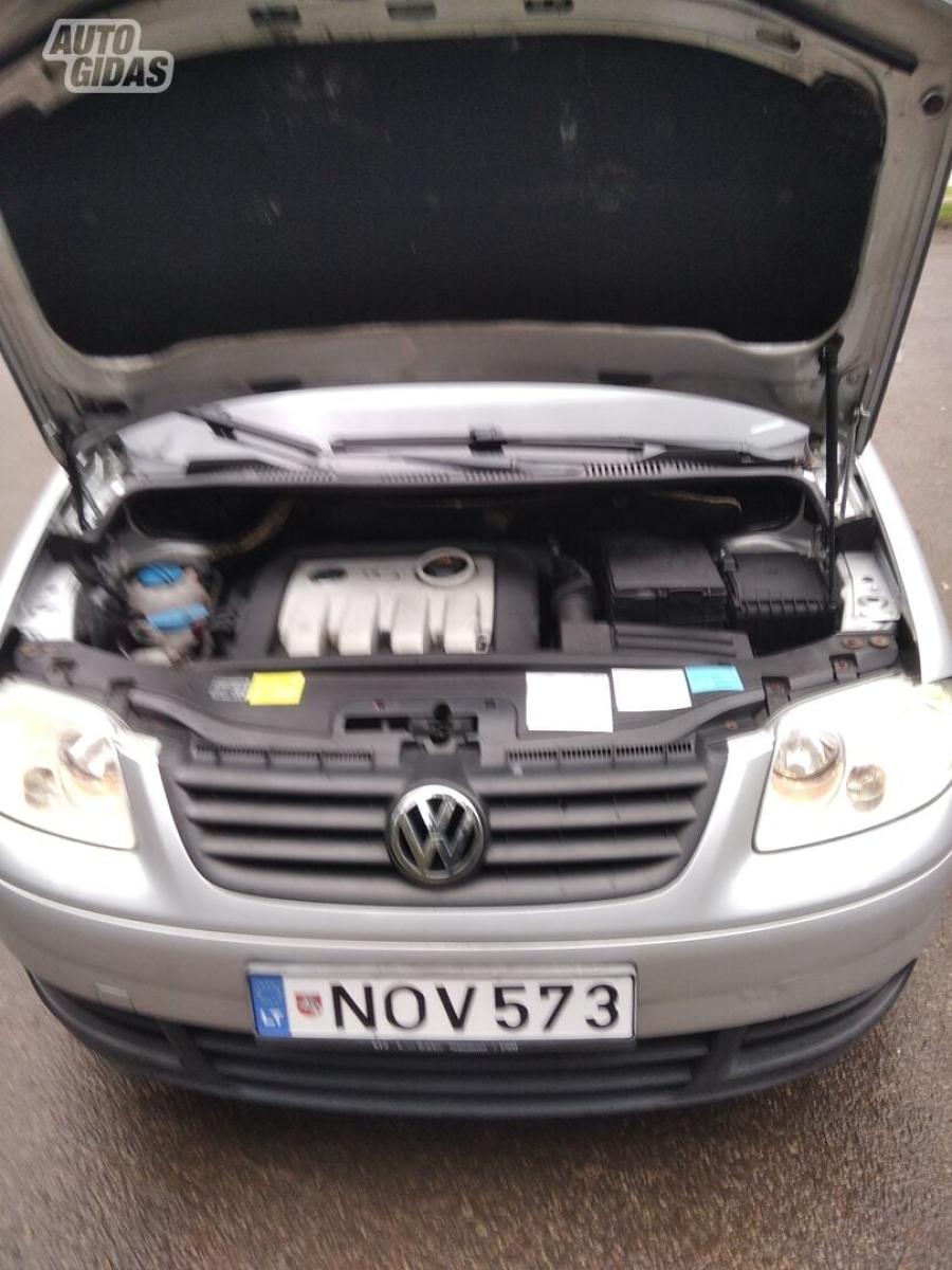 Grey Volkswagen Touran 2005 in Taurage, with an engine capacity of 1.90 L and mileage of 272 thousand km for 2400 €, photo 8 on AUTOMOTO.COM.LV