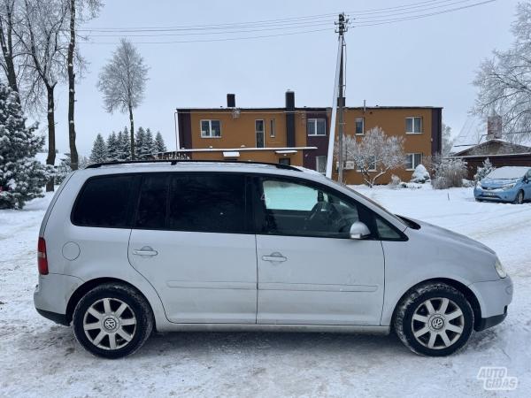 Grey Volkswagen Touran 2005 in Panevezys, with an engine capacity of 1.90 L and mileage of 400 thousand km for 1550 €, photo 6 on AUTOMOTO.COM.LV