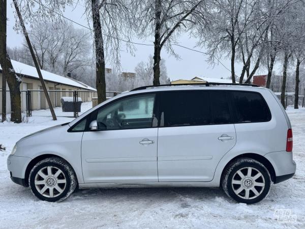 Grey Volkswagen Touran 2005 in Panevezys, with an engine capacity of 1.90 L and mileage of 400 thousand km for 1550 €, photo 7 on AUTOMOTO.COM.LV