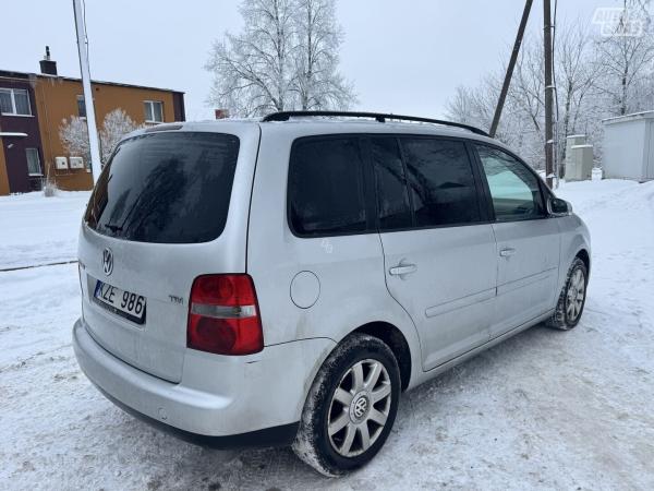 Grey Volkswagen Touran 2005 in Panevezys, with an engine capacity of 1.90 L and mileage of 400 thousand km for 1550 €, photo 9 on AUTOMOTO.COM.LV