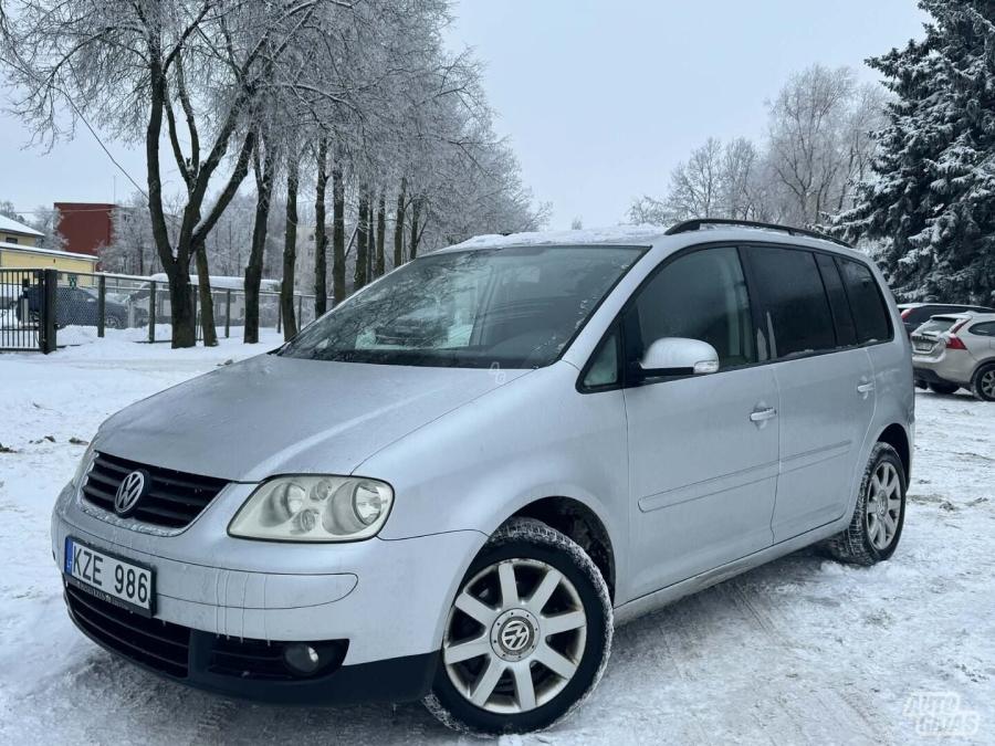 Grey Volkswagen Touran 2005 in Panevezys, with an engine capacity of 1.90 L and mileage of 400 thousand km for 1490 €, photo 1 on AUTOMOTO.COM.LV